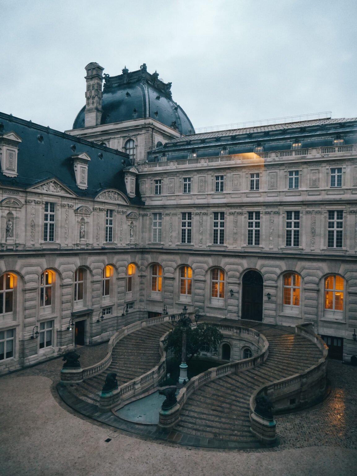 The Louvre: Visiting an Iconic Paris Museum - Compasses & Quests